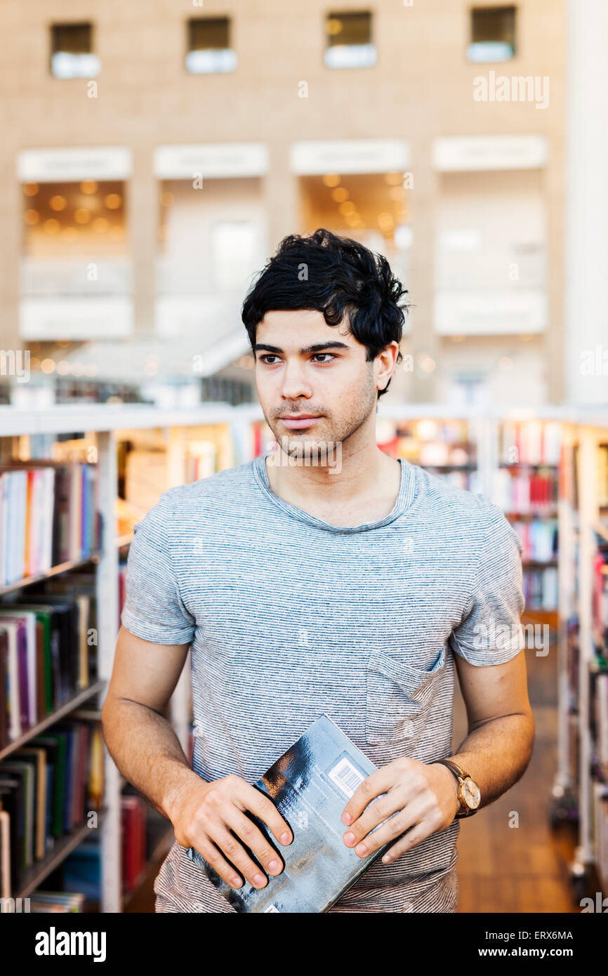 Man standing on books hi-res stock photography and images - Alamy
