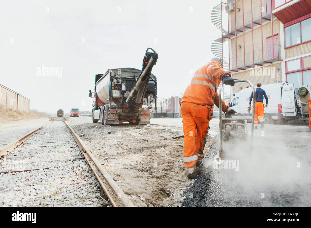 Manual laying asphalt construction site hi-res stock photography and ...