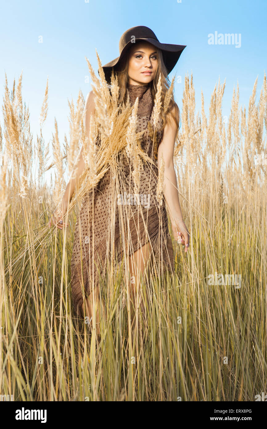 Young model in tallgrass meadow - sunrise shot Stock Photo - Alamy