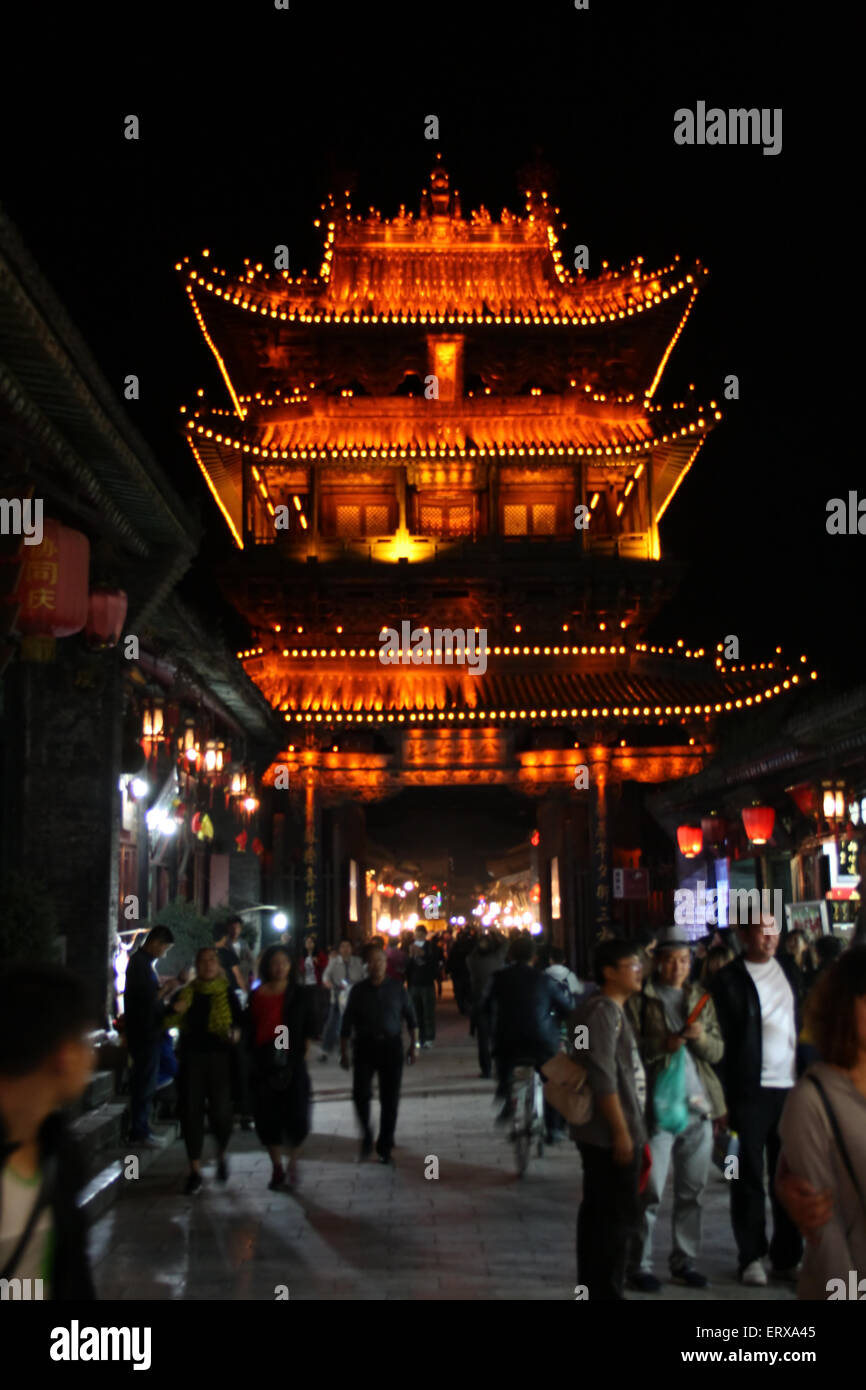 Bright night lights of the ancient Chinese city of Pingyao. China Stock ...