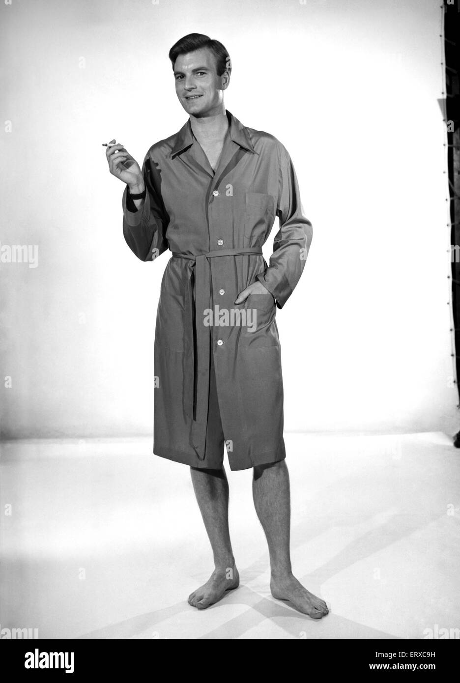 Model Jeremy Dempster wearing a sleeping coat. 1957 Stock Photo - Alamy