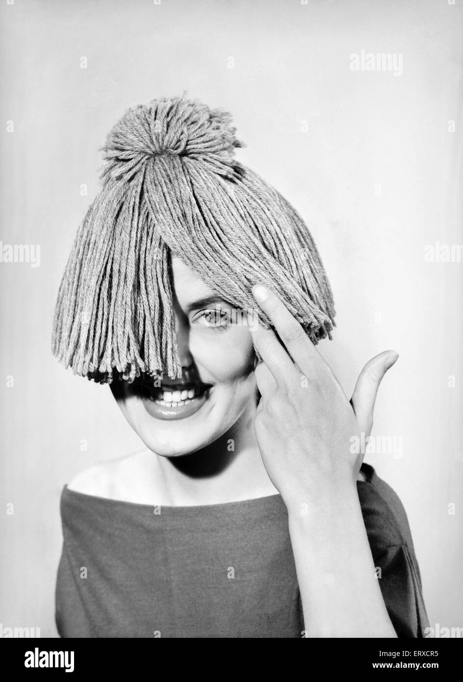 Woman wearing mop hat. 1955 Stock Photo - Alamy
