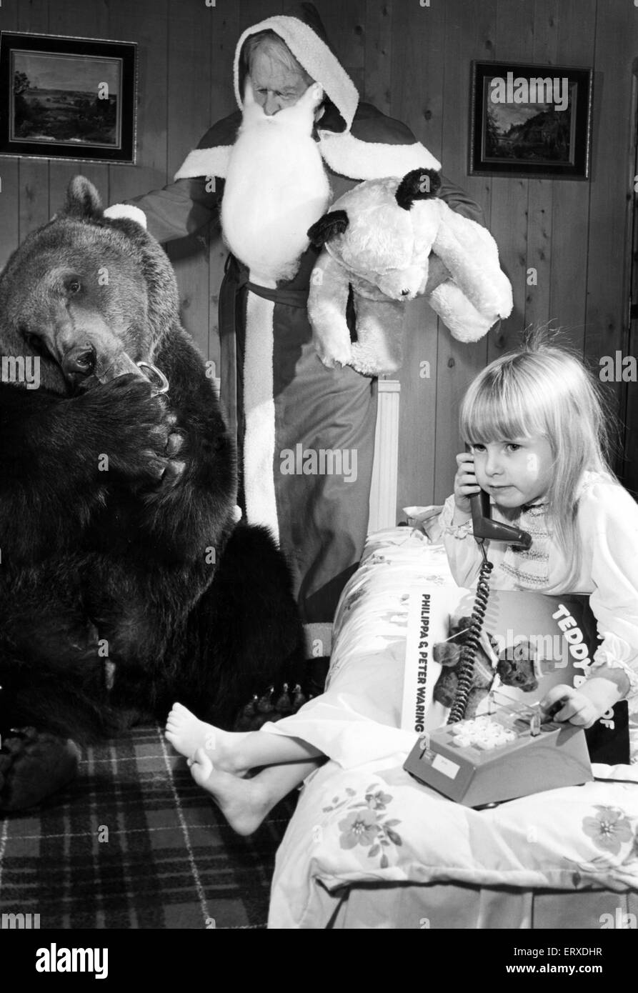 Four year old Gayl Mather chats to Santa Claus about her adventures ...