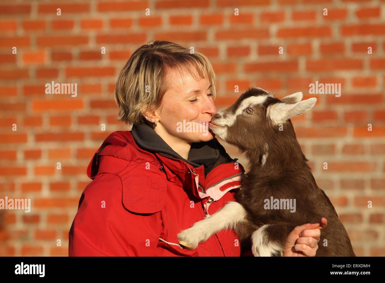 Woman with goat hi-res stock photography and images - Alamy