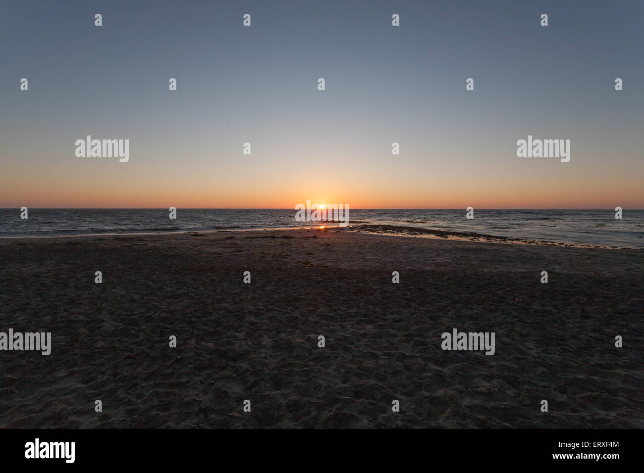Namibian sunset at Swakopmund beach Stock Photo - Alamy