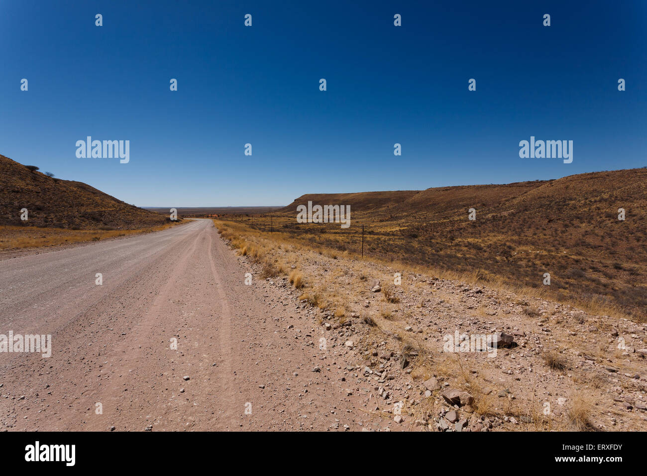 Dirt road out of Mata Mata gate to Kalahari desert Stock Photo - Alamy