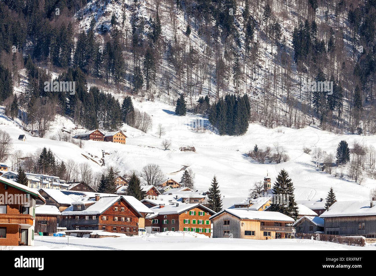 Alpine village in the snow Stock Photo - Alamy