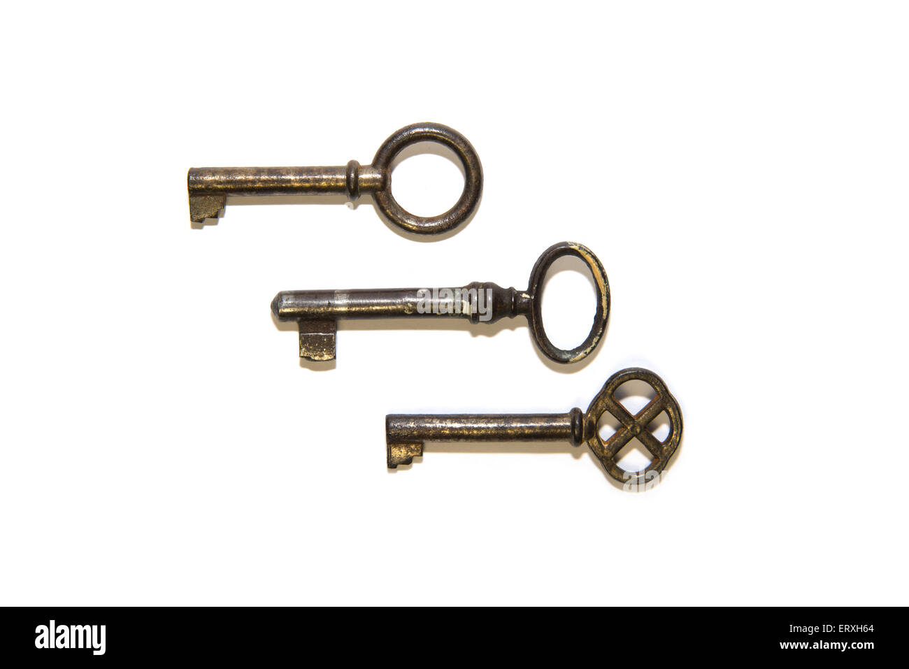 Three old key on white background Stock Photo - Alamy
