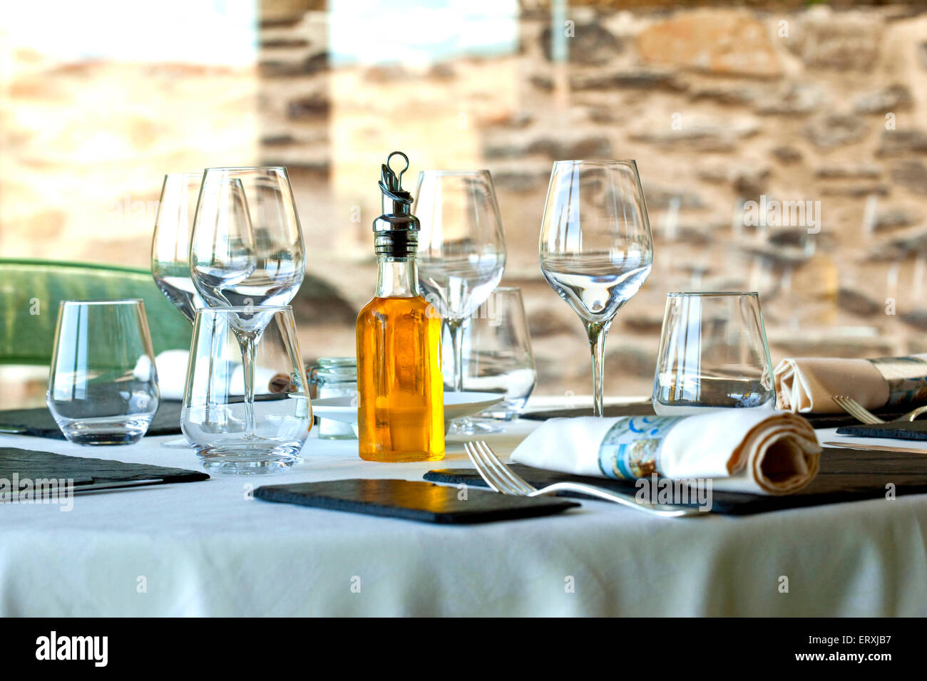 Table set up in a stylish French restaurant Stock Photo - Alamy