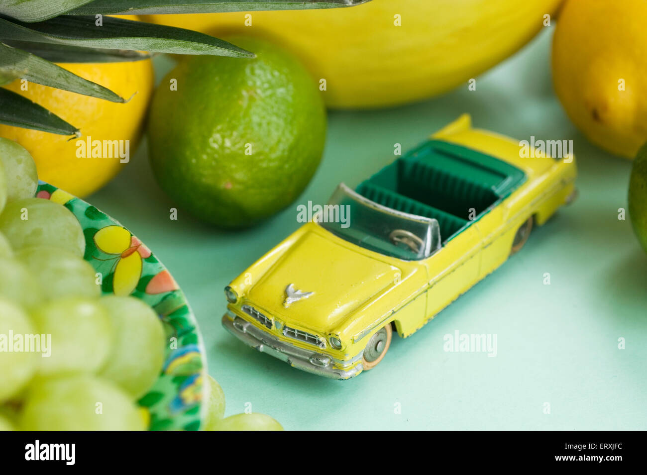Dinky toy Chrysler New Yorker car surrounded by citrus fruit Stock ...