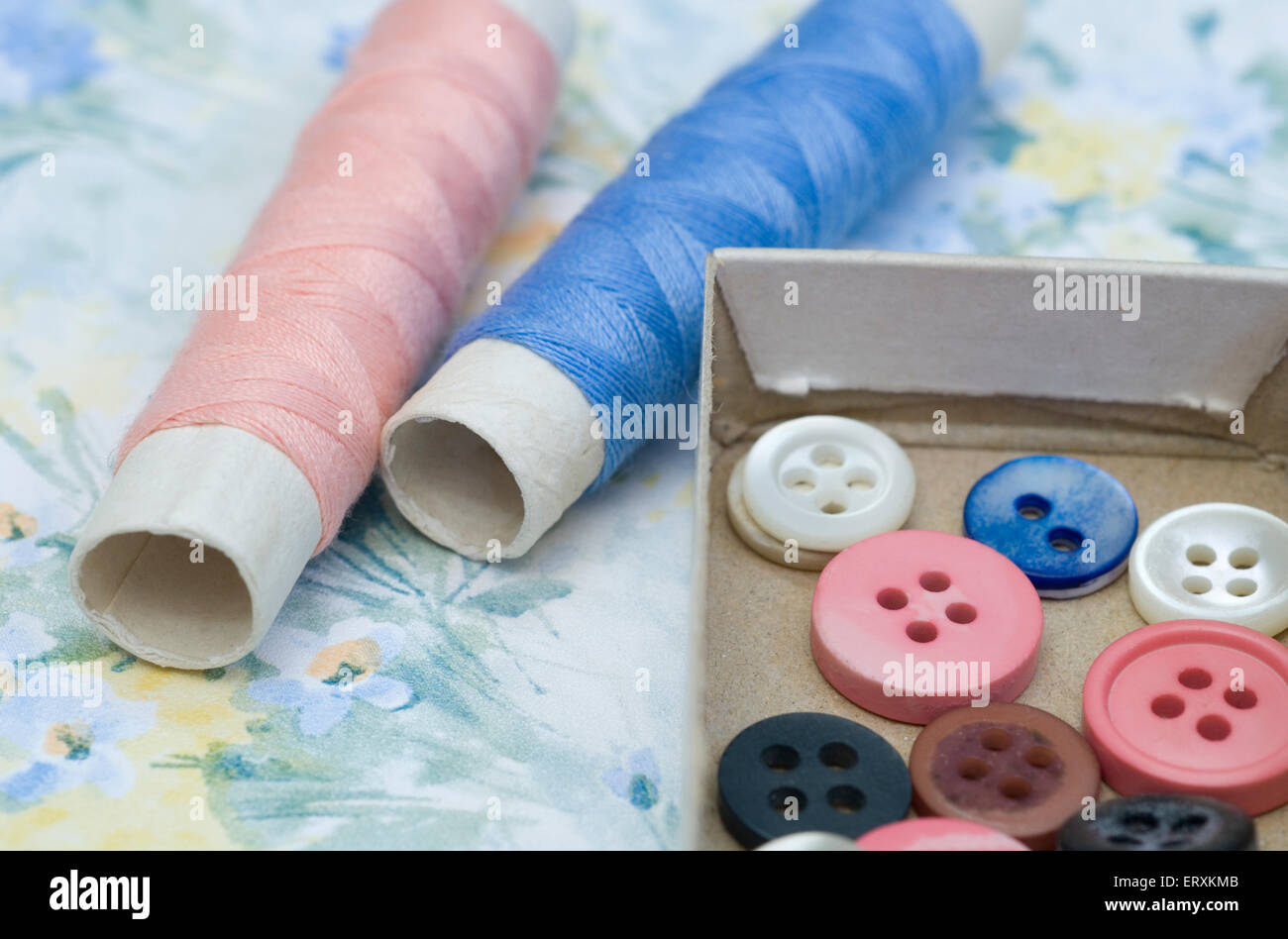 buttons and spools of thread Stock Photo - Alamy