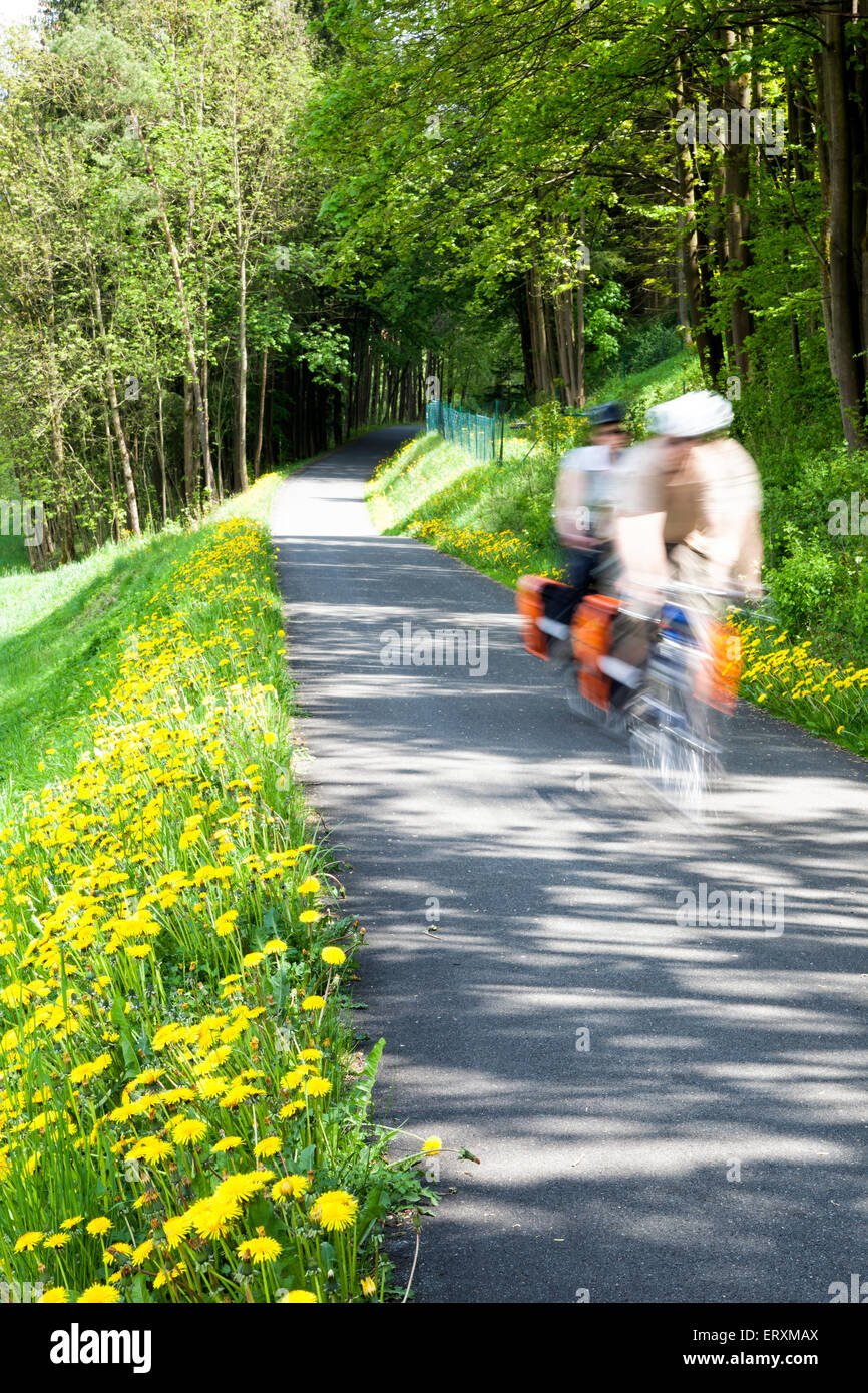 People cycling through countryside Stock Photo - Alamy