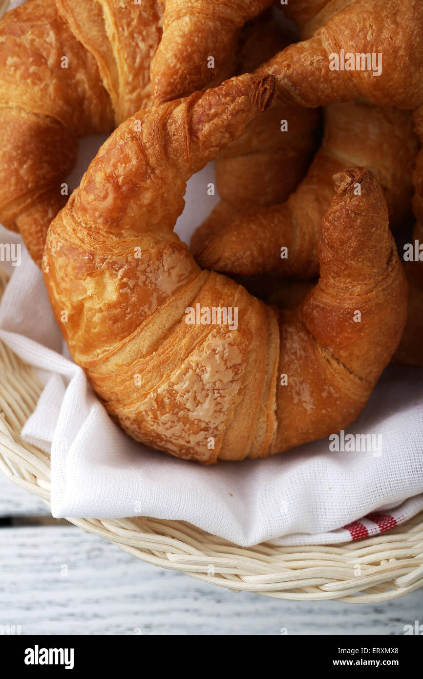 Fresh croissants in a basket, food close up Stock Photo - Alamy