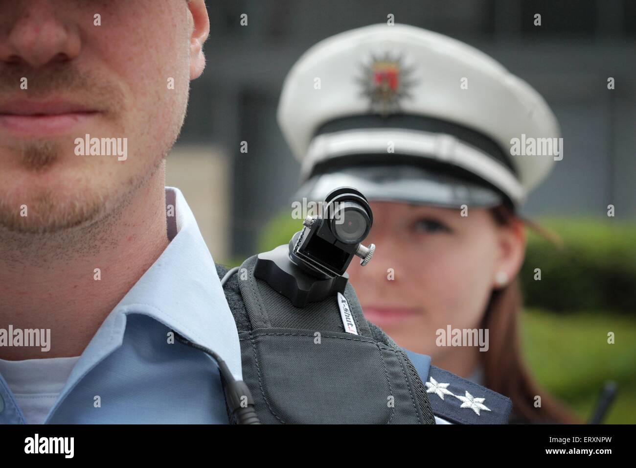 Mainz, Germany. 08th June, 2015. A German police officer has a small ...
