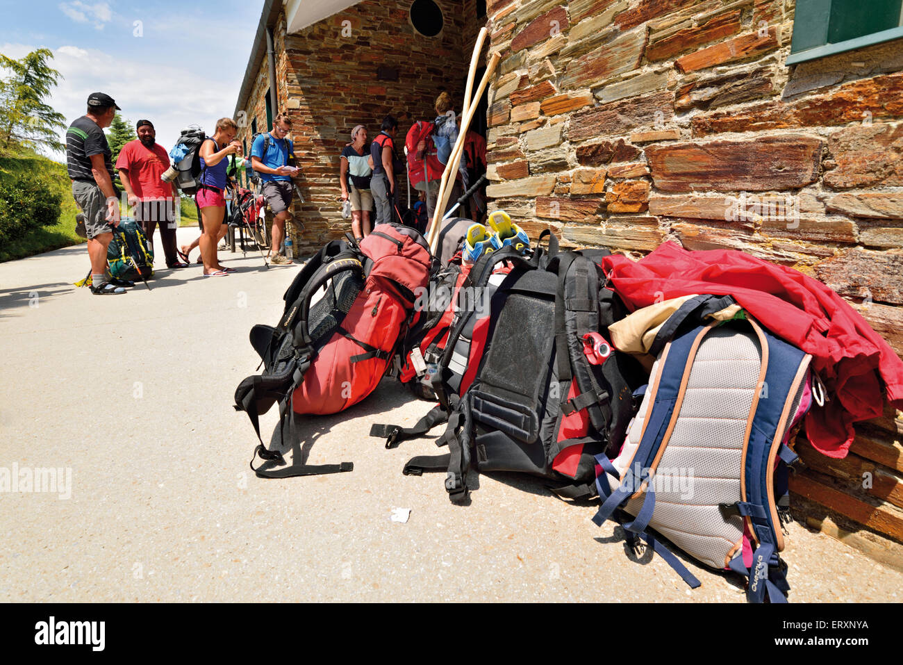 Pilgrims with backpacks in camino de santiago hi-res stock photography ...
