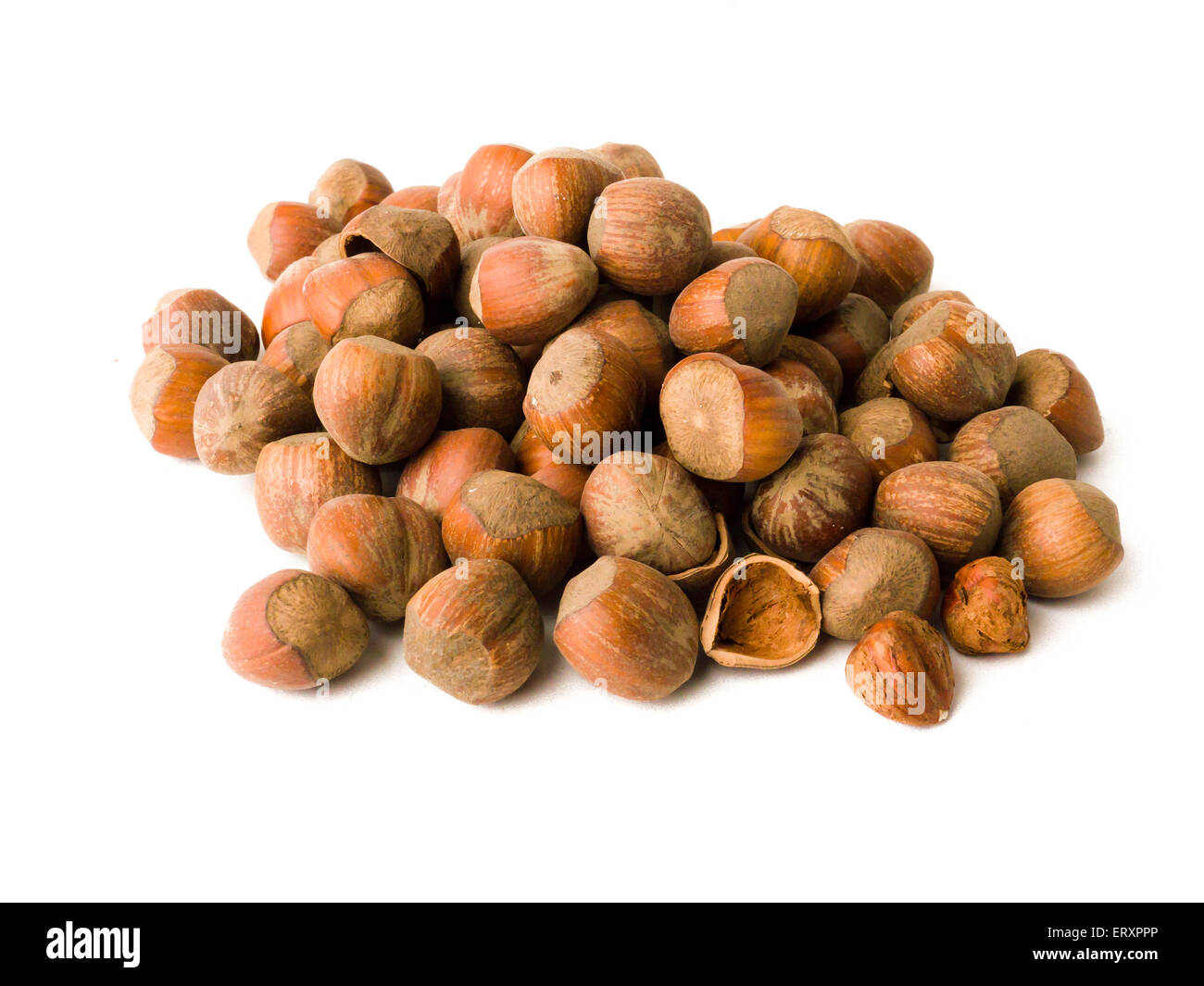 Pile of hazelnuts isolated on white Stock Photo - Alamy