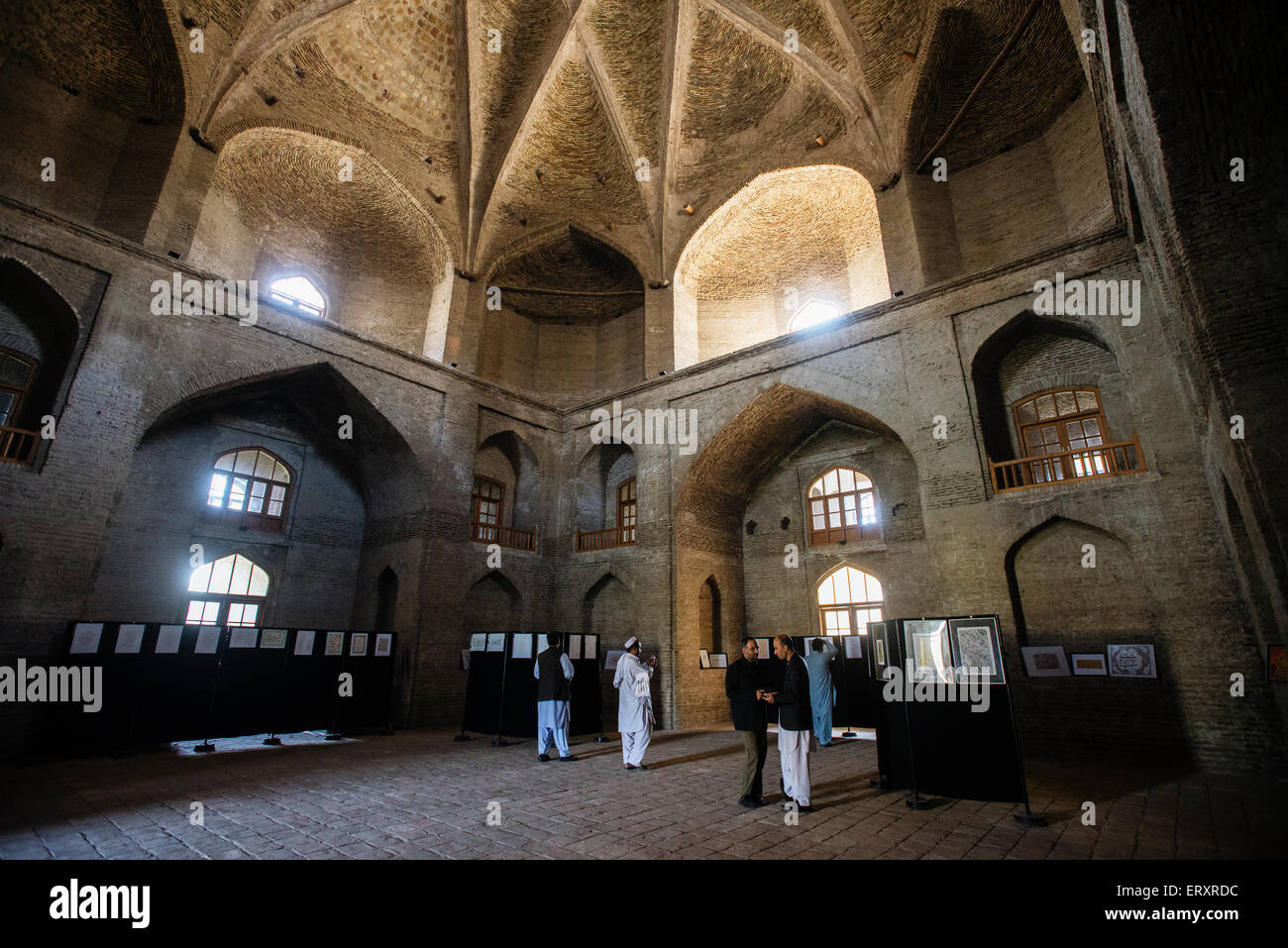 Visitors attend the Afghan calligraphy exhibition in Timur Shah ...
