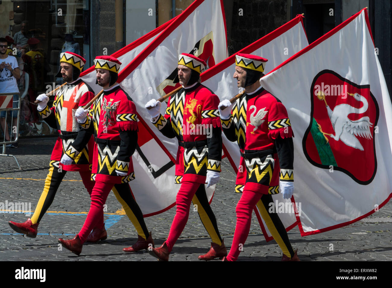 Flag bearers in the Corpus Domini procession in Orvieto in Umbria ...