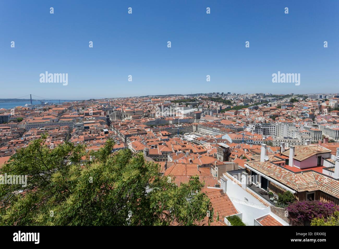 A view over the red rooftops of Lisbon city, the capital city of ...