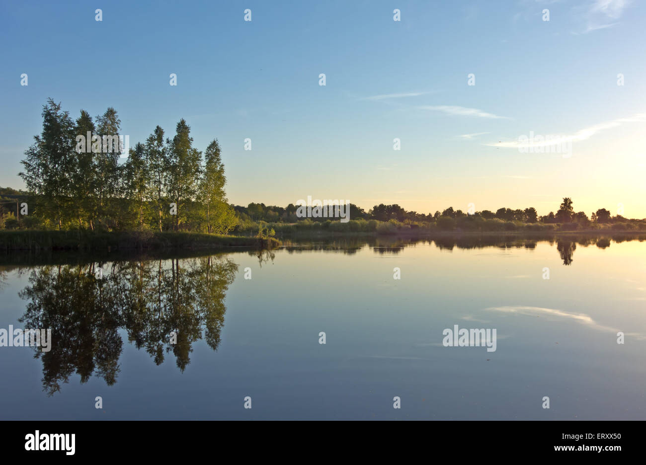 beautiful sunset over lake Stock Photo - Alamy