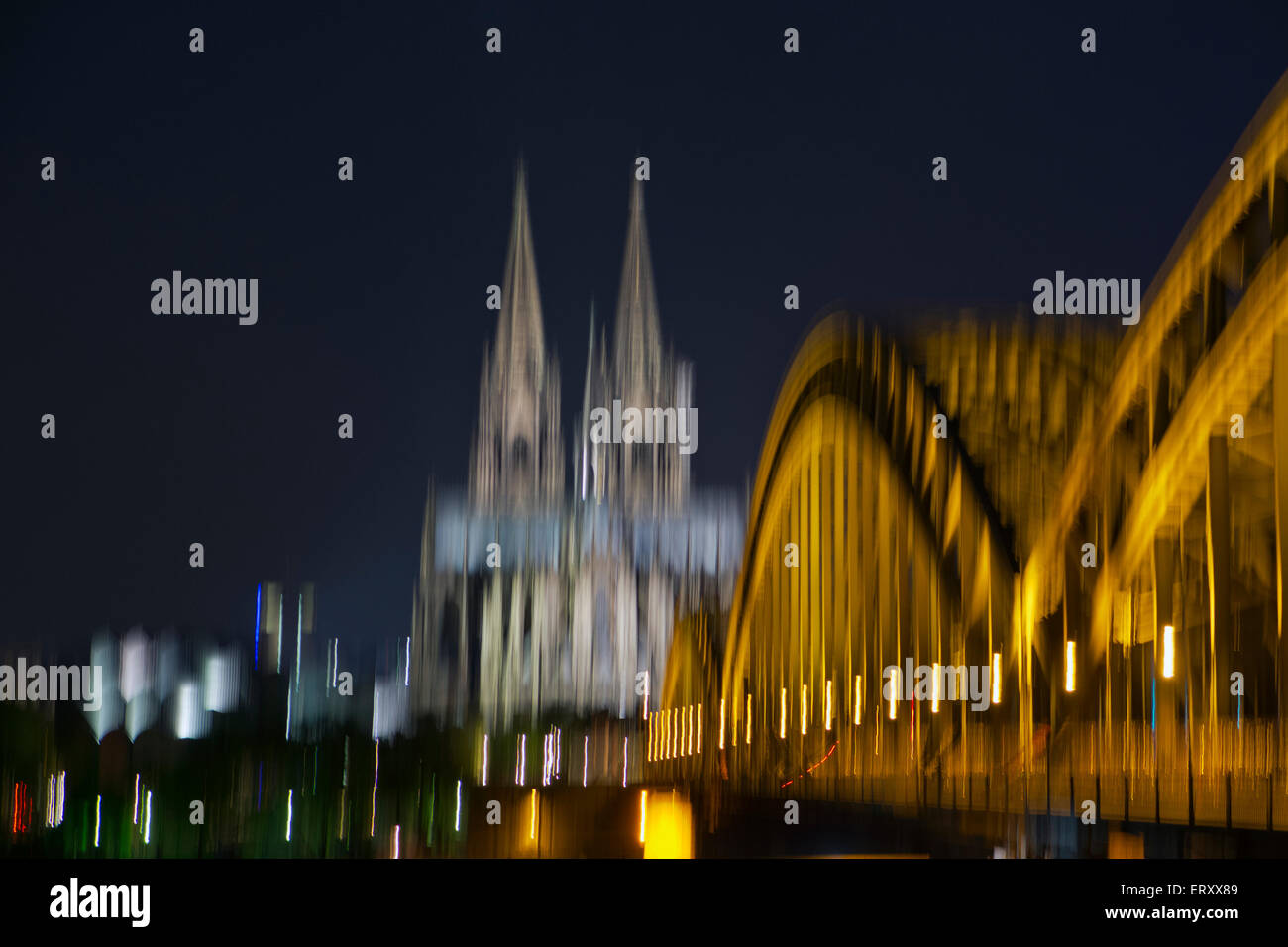 Cologne Rhine Germany Cathedral bridge night scene towers railway river ...