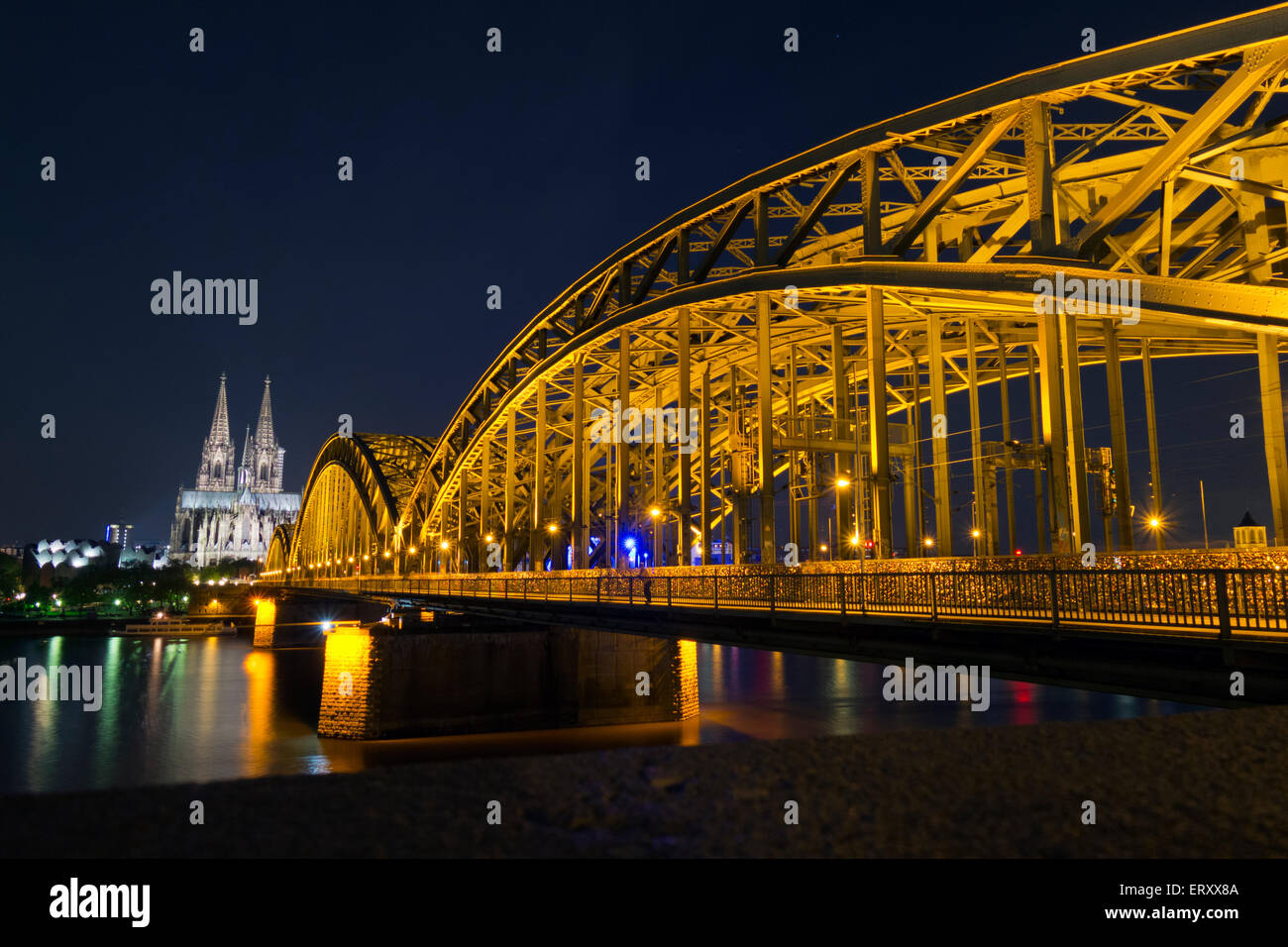 Cologne Rhine Germany Cathedral bridge night scene towers railway river ...