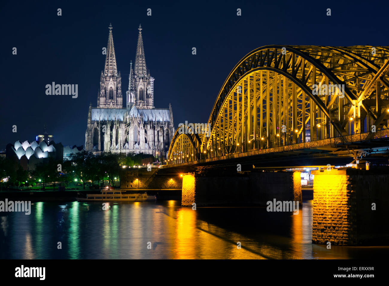 Cologne Rhine Germany Cathedral bridge night scene towers railway river ...