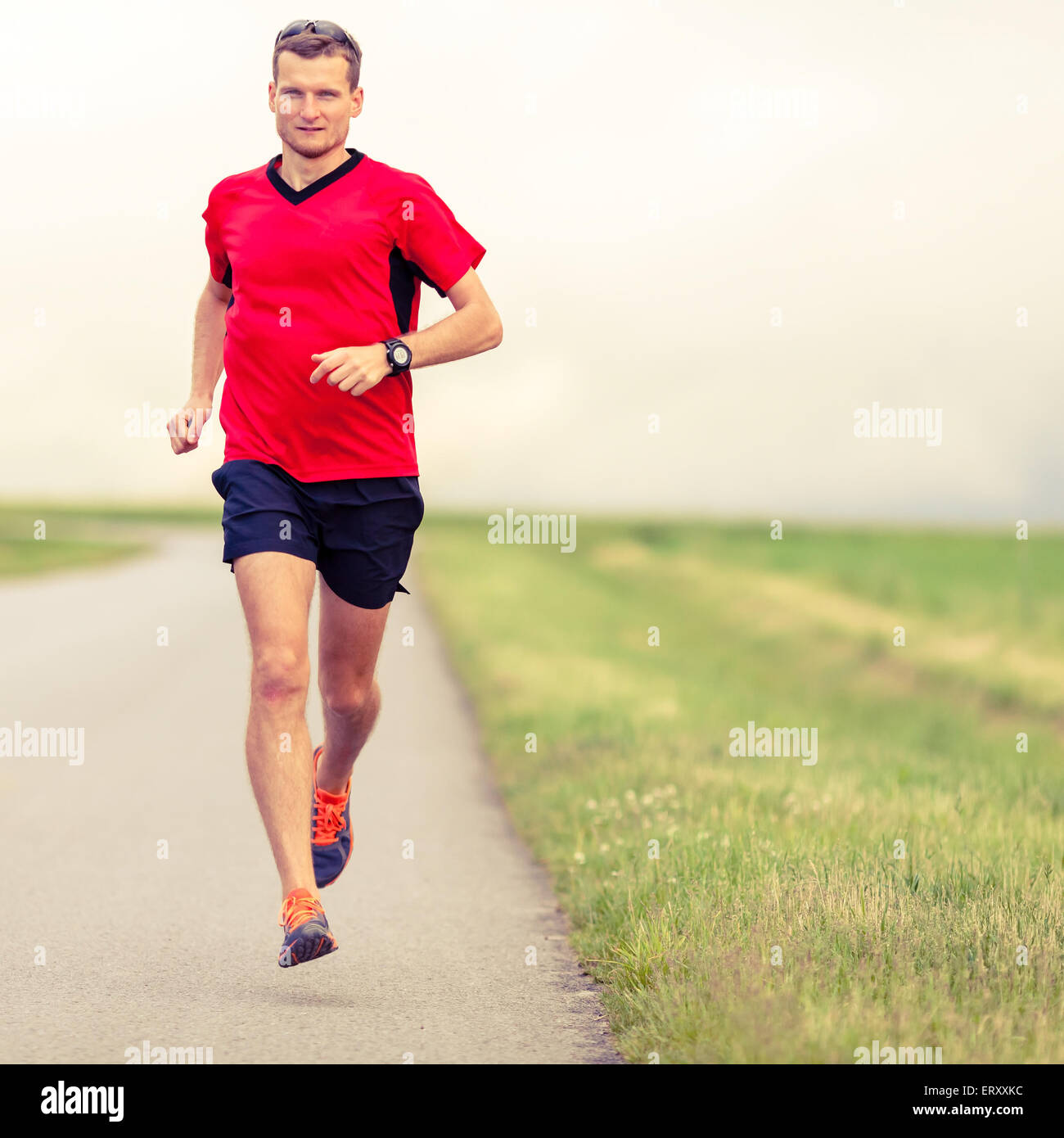 Man running on country road, healthy fitness lifestyle, sport speed ...