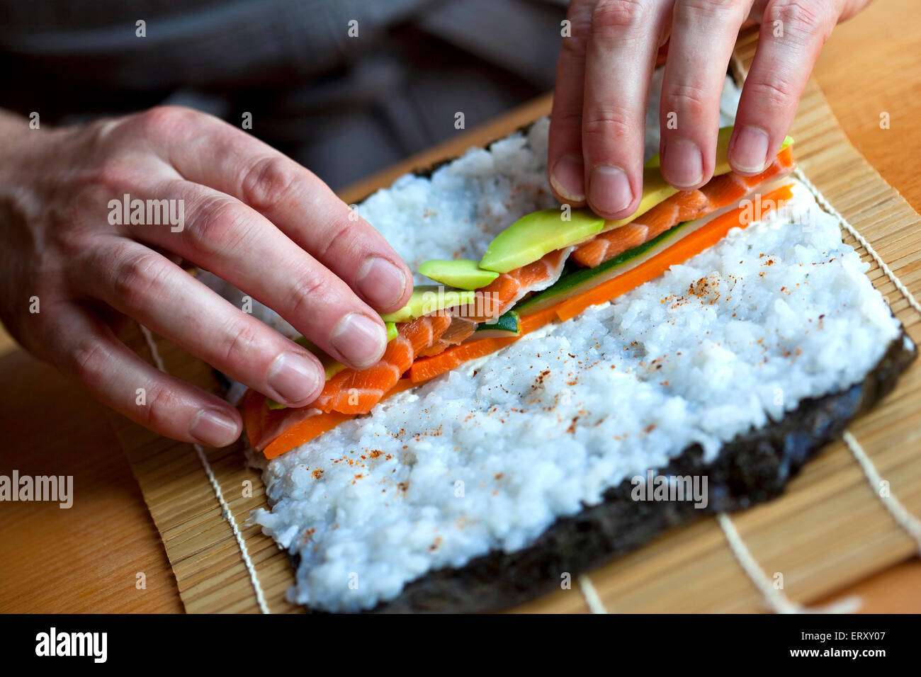 Japanese chef cooking maki in a restaurant Stock Photo - Alamy