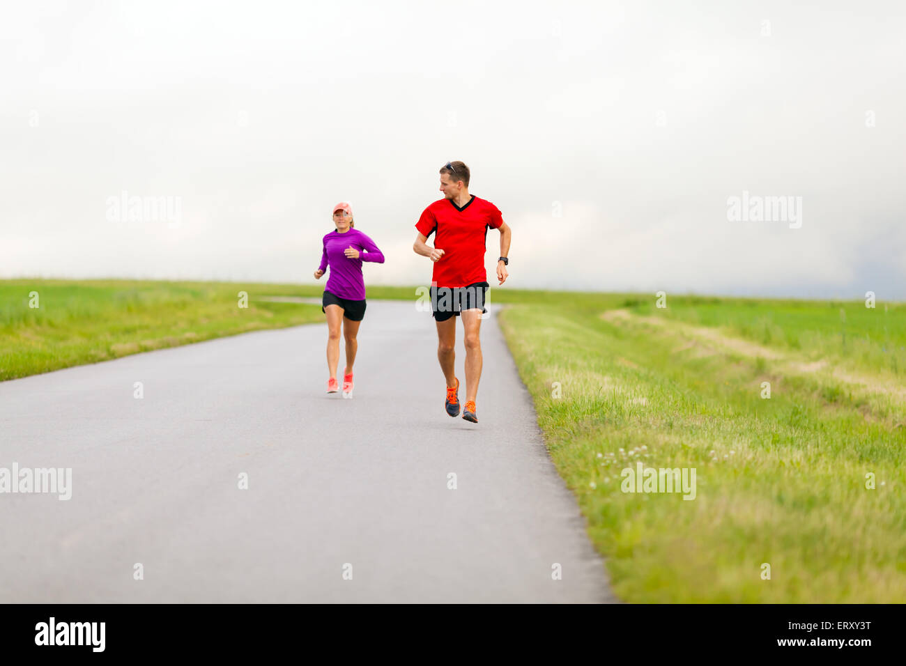 Woman running man walking hi-res stock photography and images - Alamy