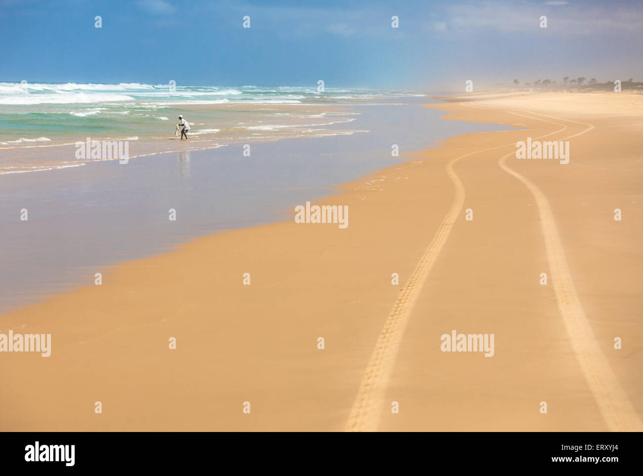 Fisherman and wheel traces on sand, Senegal Stock Photo - Alamy