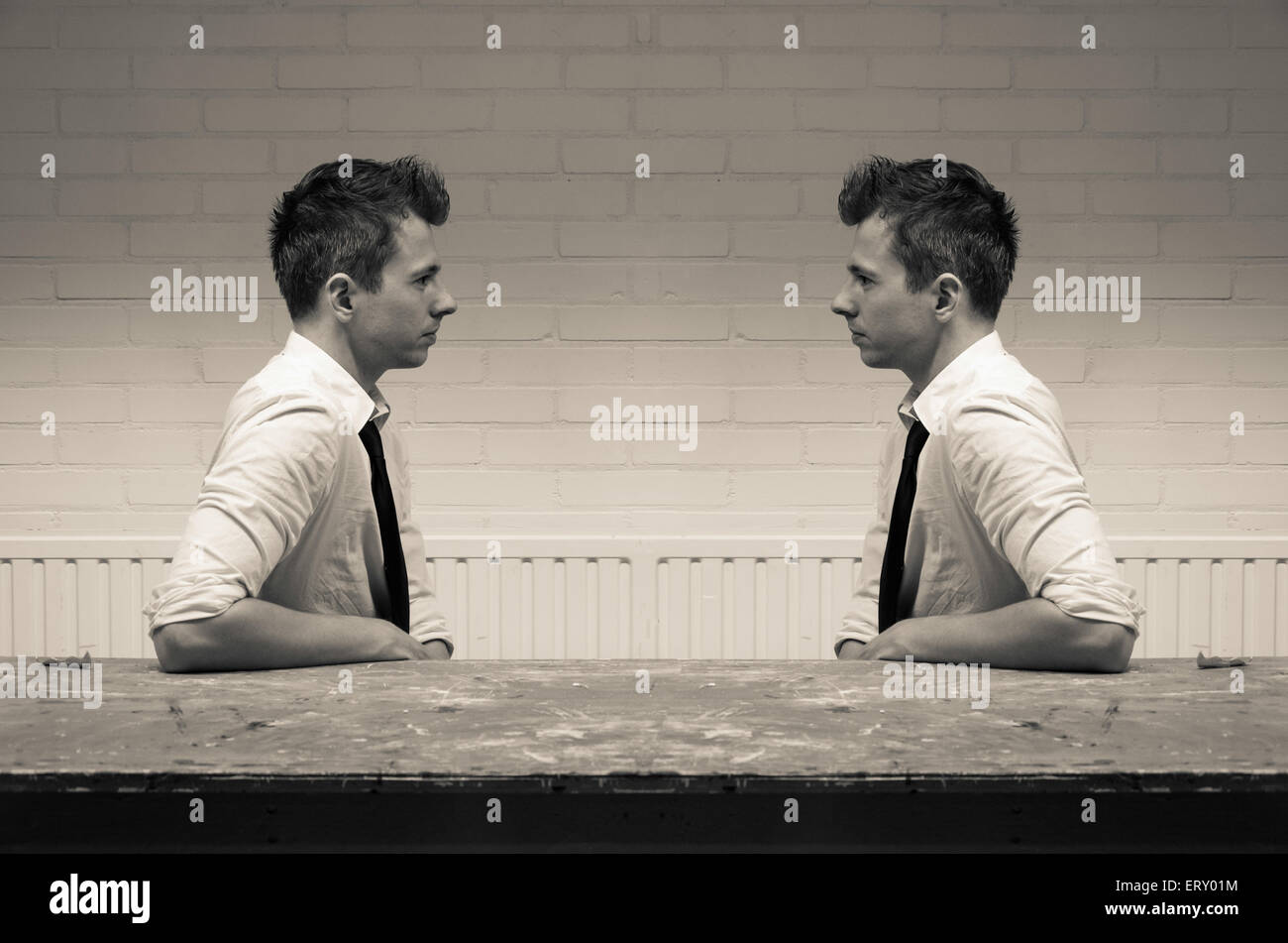 mirroring twins in communication Stock Photo - Alamy