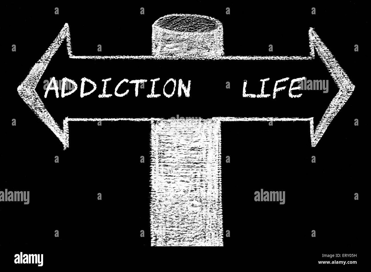 Opposite arrows with Addiction versus Life. Hand drawing with chalk on ...