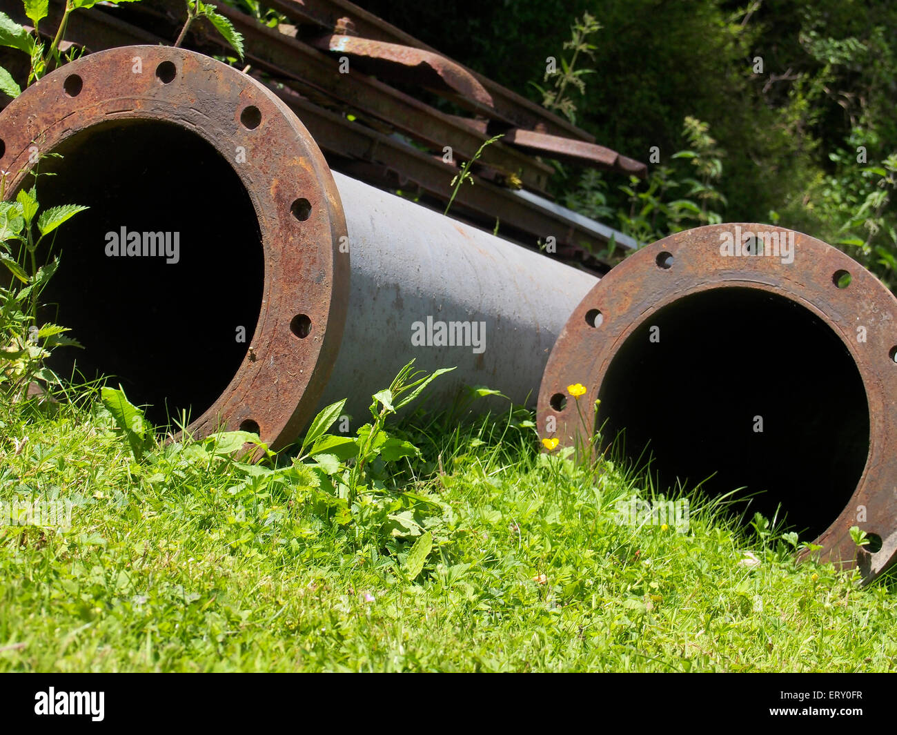 Large Bore Steel Pipes or Tubes Stored At An Industrial Site Stock large-bore-steel-pipes-or-tubes-stored-at-an-industrial-site-stock