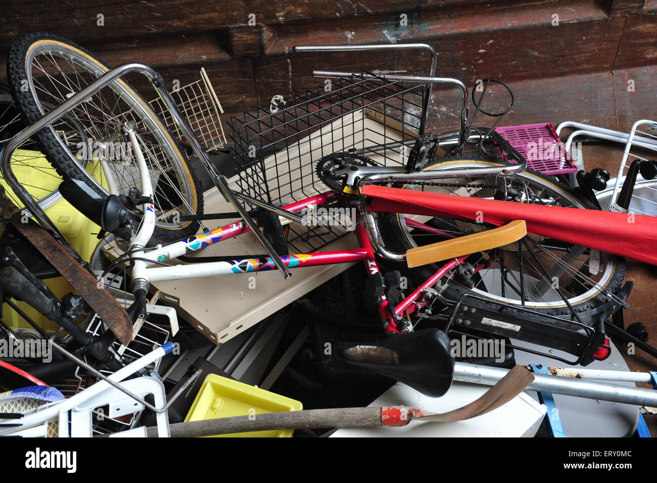Scrap iron in a container for recycling Stock Photo - Alamy