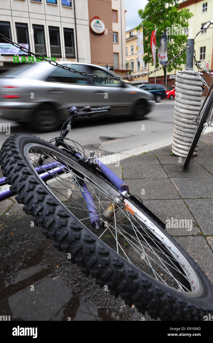 Bicycle accident on walkway with car Stock Photo - Alamy