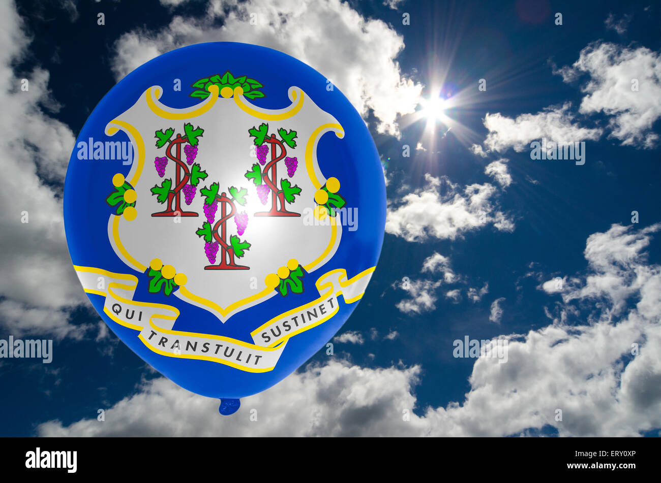 balloon in colors of connecticut flag flying on blue sky Stock Photo ...