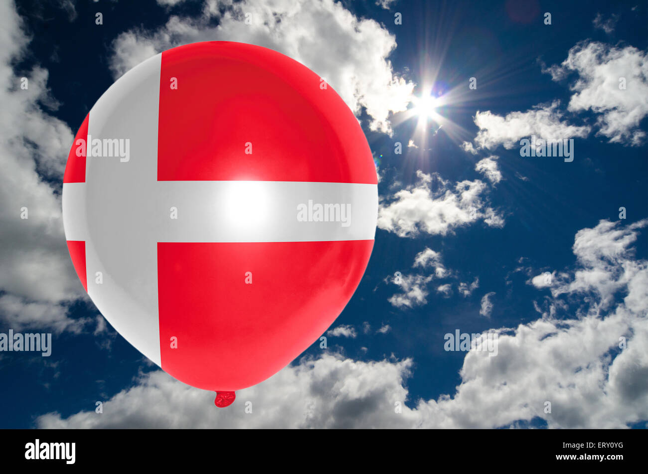balloon in colors of denmark flag flying on blue sky Stock Photo - Alamy