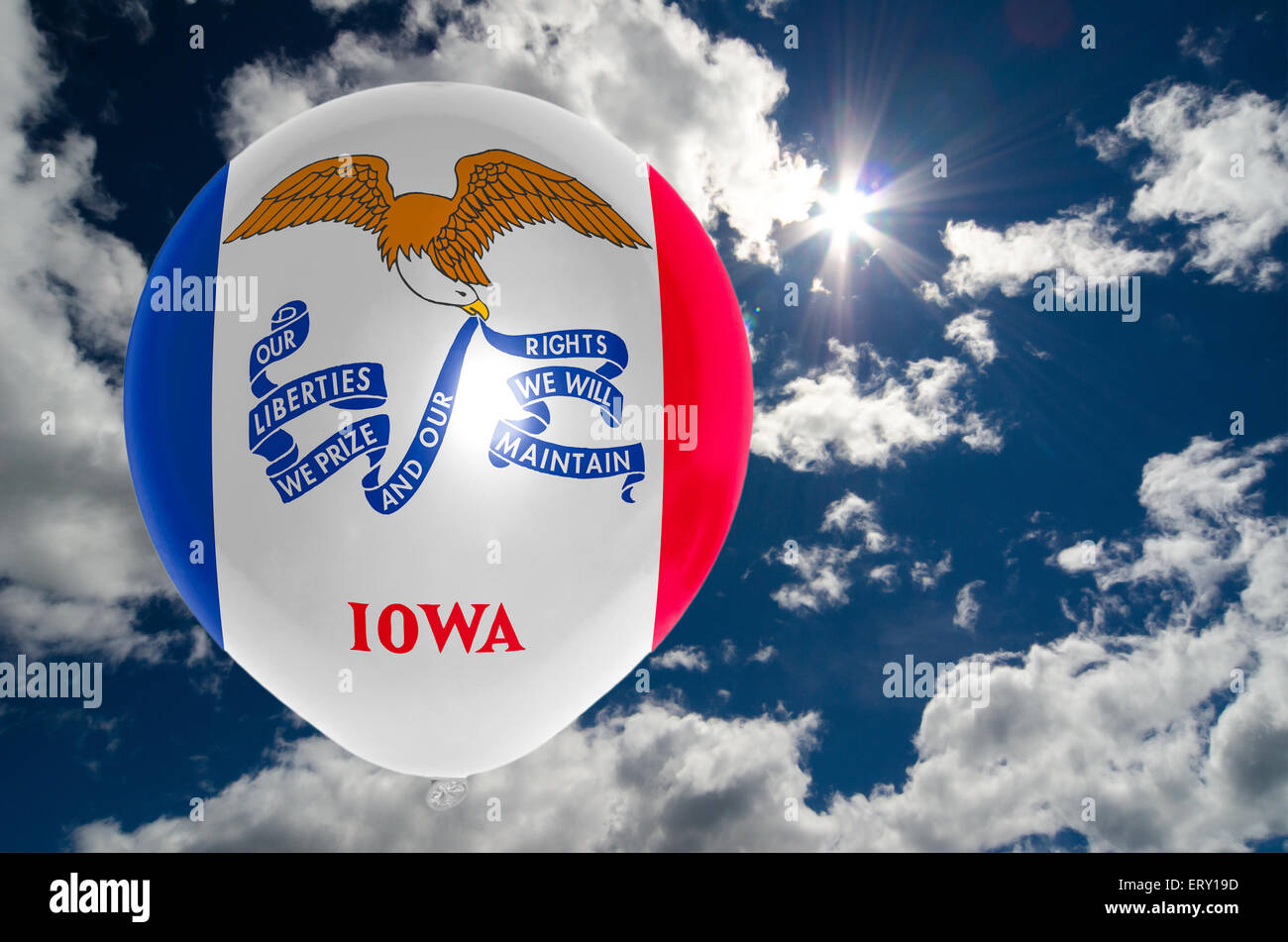 balloon in colors of iowa flag flying on blue sky Stock Photo - Alamy