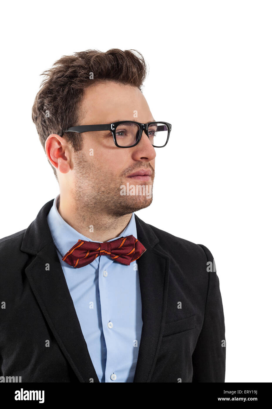 Profile of a young businessman with a red bow and spectacles, against a ...