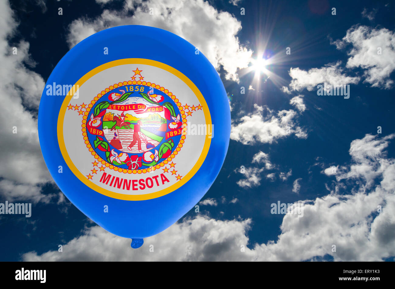 balloon in colors of minnesota flag flying on blue sky Stock Photo - Alamy