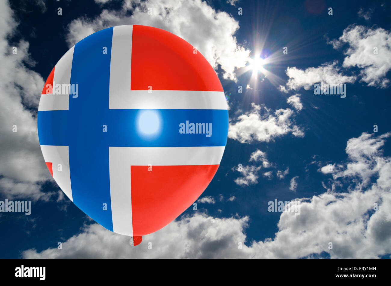 balloon in colors of norway flag flying on blue sky Stock Photo - Alamy