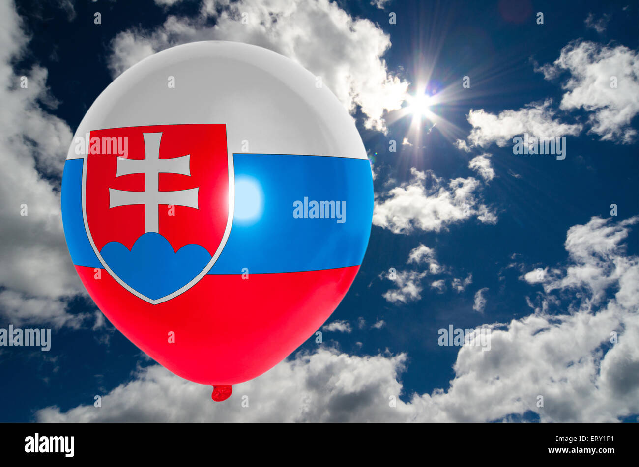 balloon in colors of slovakia flag flying on blue sky Stock Photo - Alamy