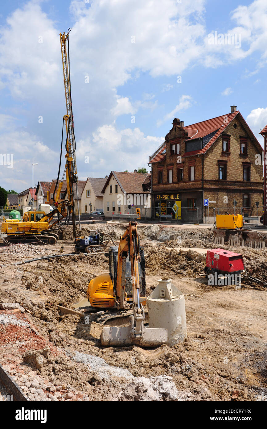 Construction site with yellow machines Stock Photo - Alamy