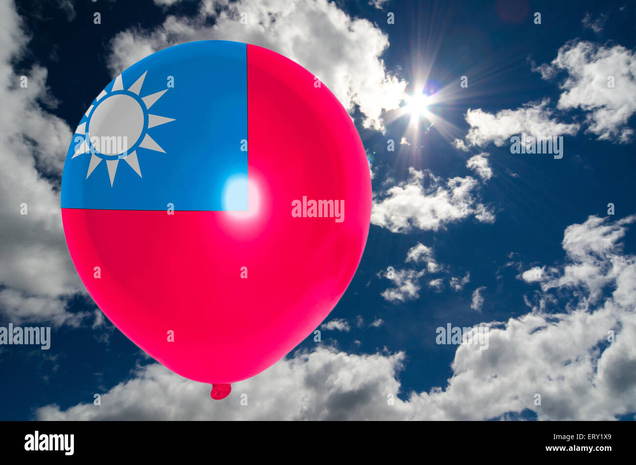 balloon in colors of taiwan flag flying on blue sky Stock Photo - Alamy