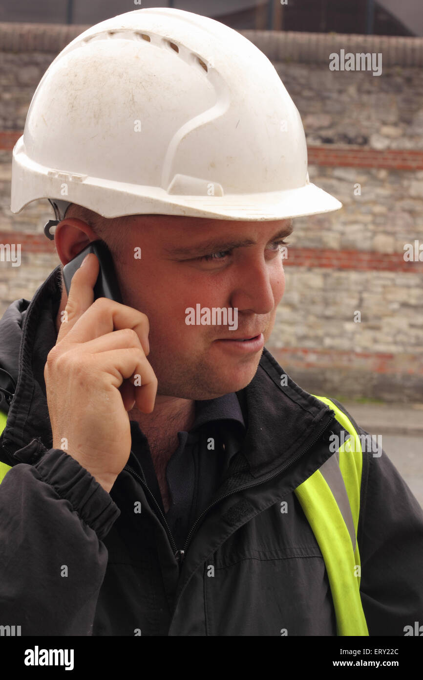An engineer talking on his mobile phone Stock Photo - Alamy