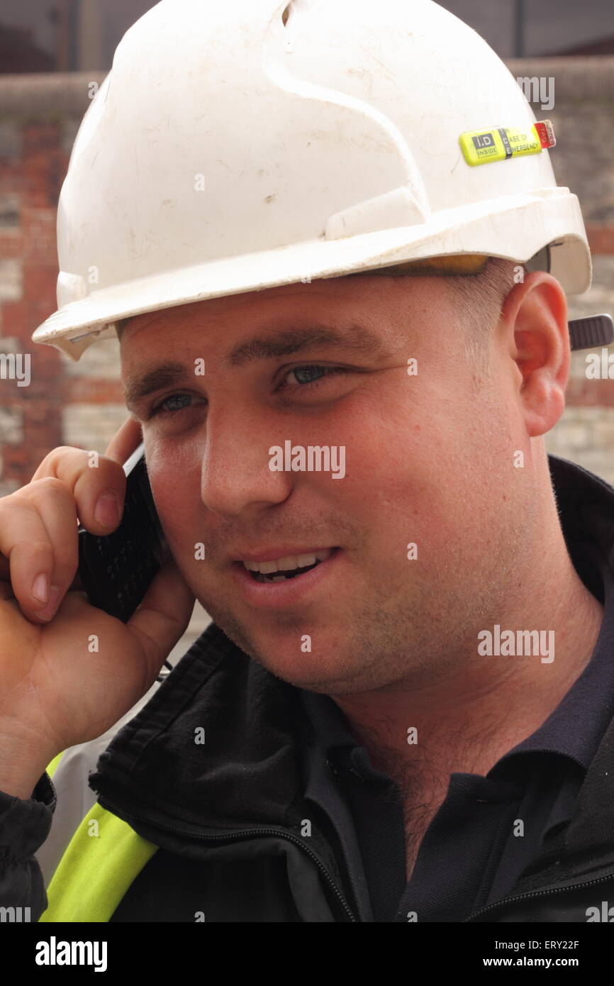 An engineer talking on his mobile phone Stock Photo - Alamy