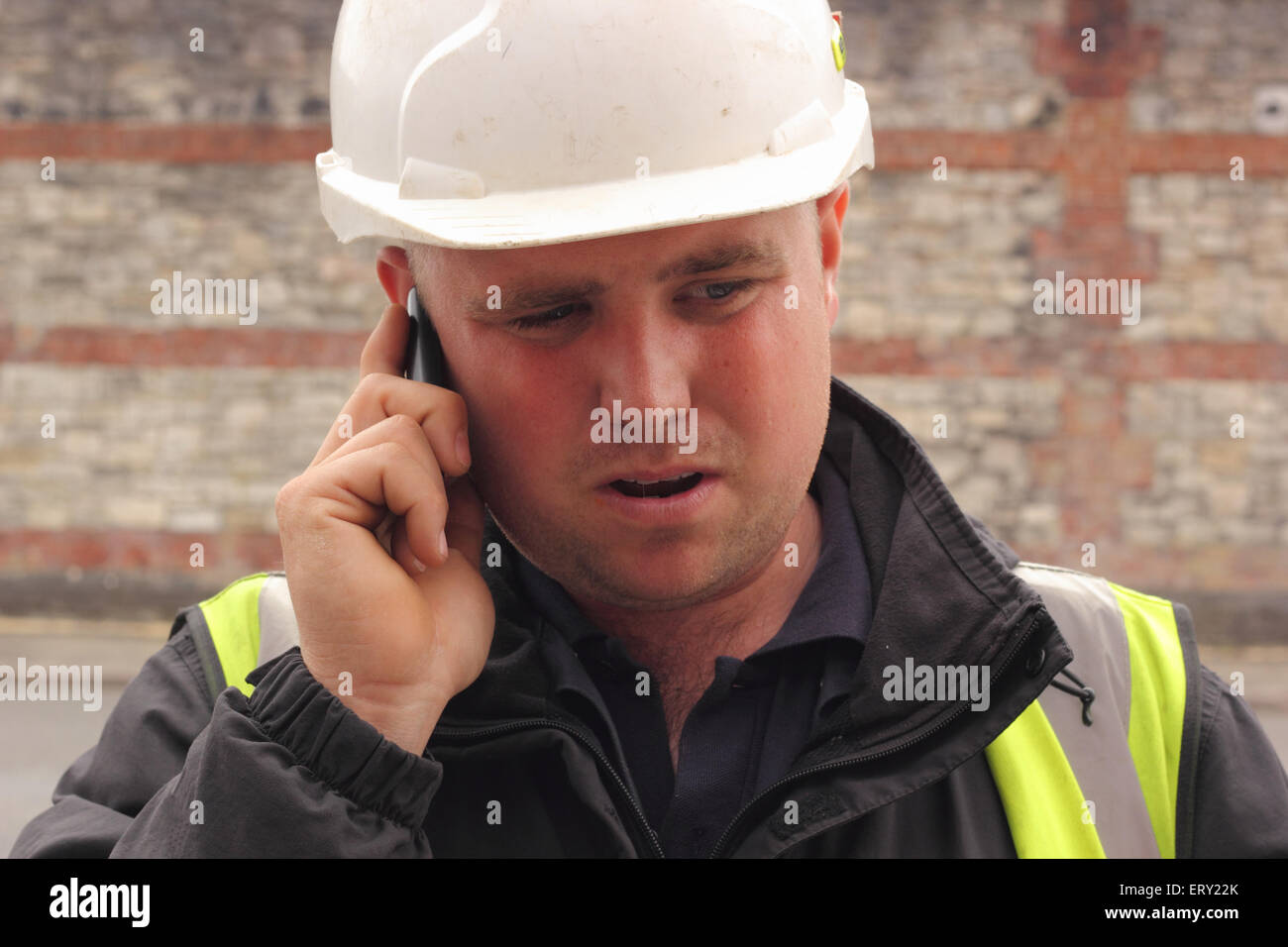 An engineer talking on his mobile phone Stock Photo - Alamy