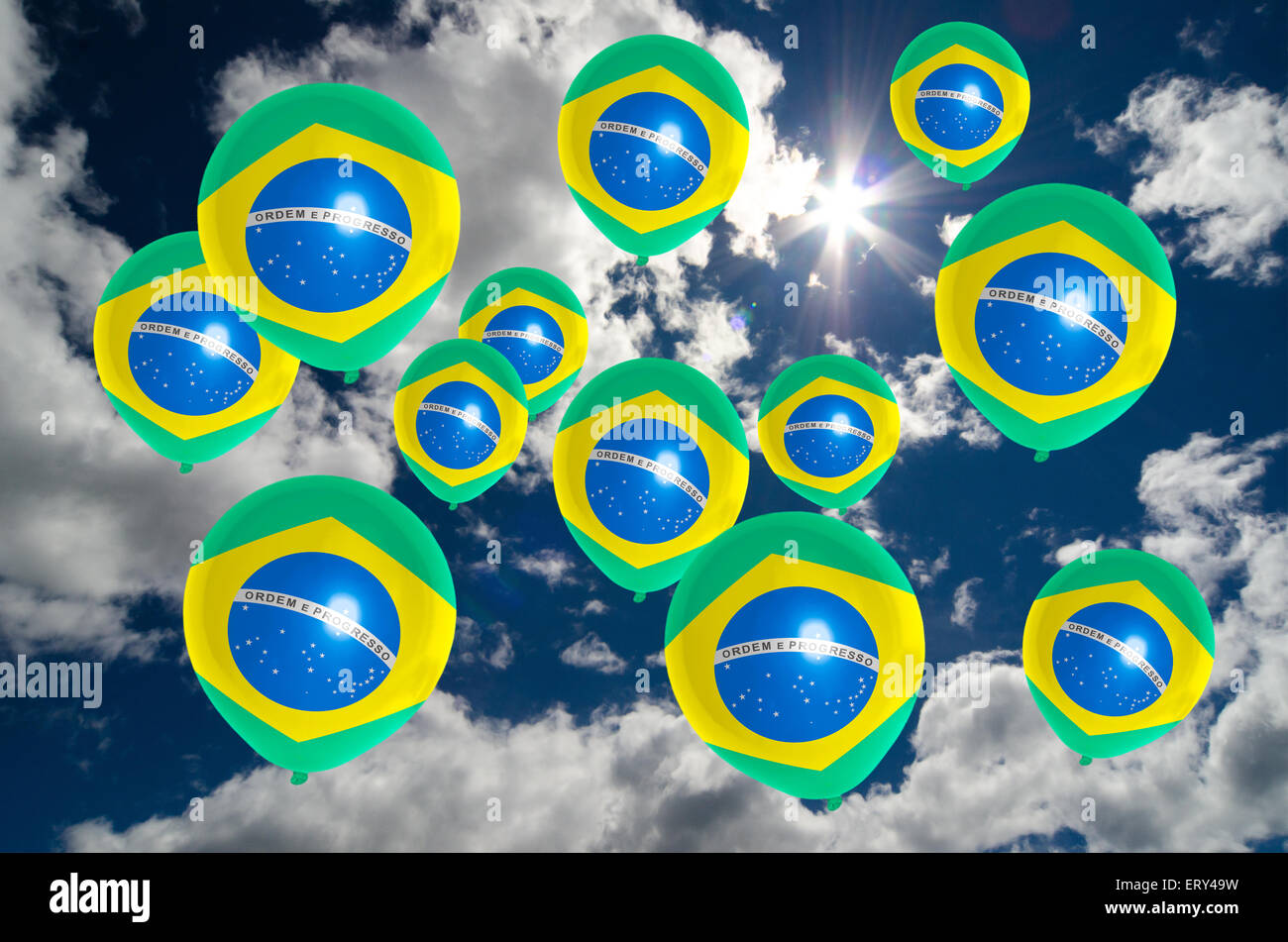 many ballons in colors of brazil flag flying on sky Stock Photo - Alamy