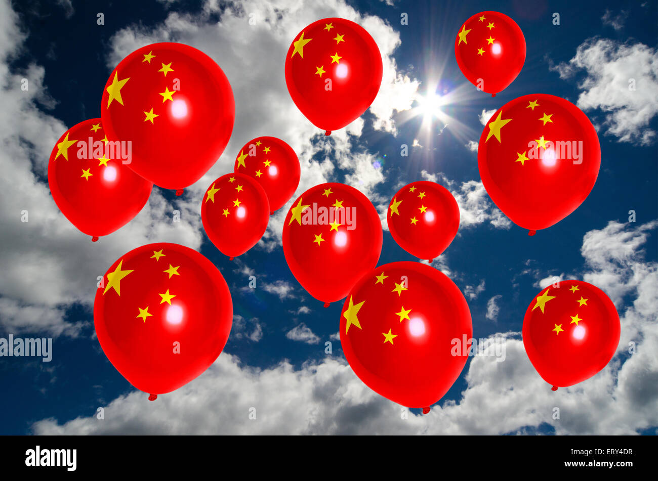 many ballons in colors of china flag flying on sky Stock Photo - Alamy